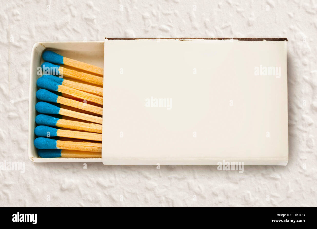Blank box of blue matches in it Stock Photo - Alamy