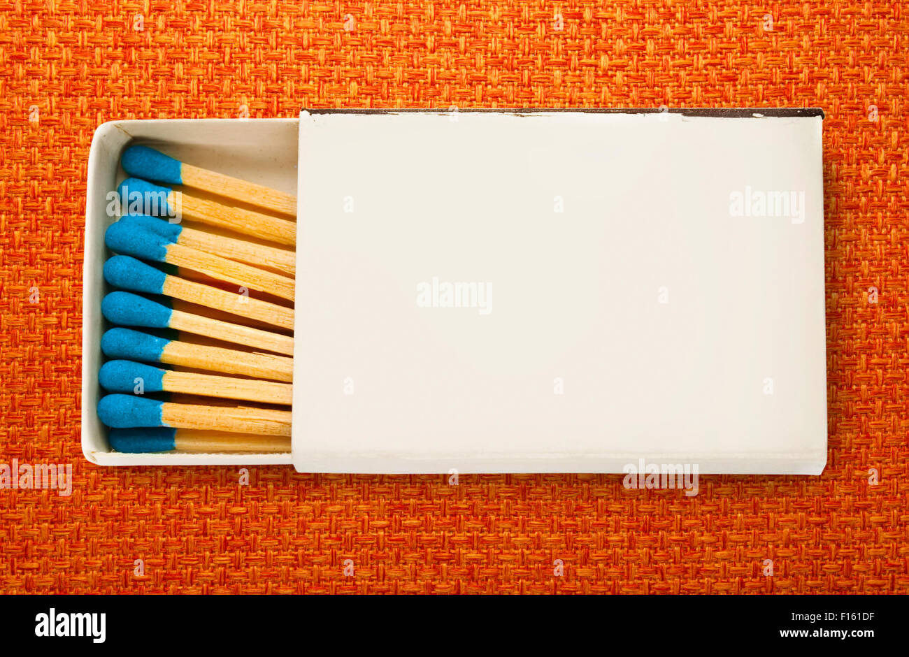 Blank box of blue matches in it Stock Photo - Alamy