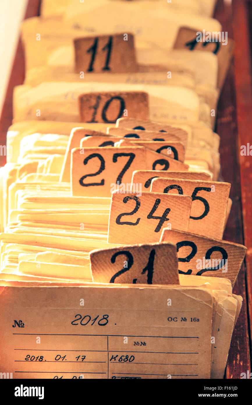 Archive file folders in drawer closeup toning Stock Photo - Alamy