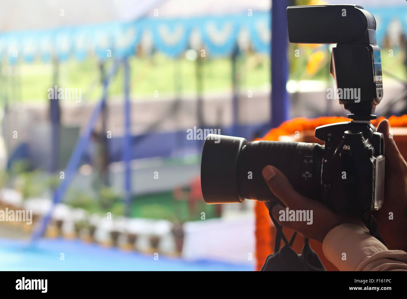 Journalist in front camera Stock Photo - Alamy