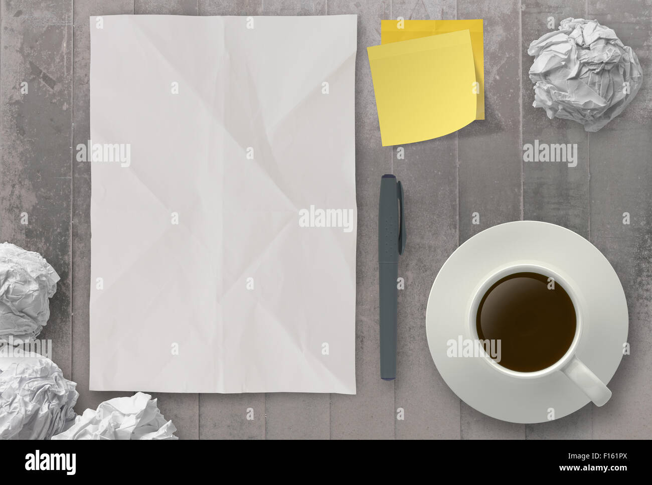 coffee cup with crumpled paper and blank sticky note background as ...