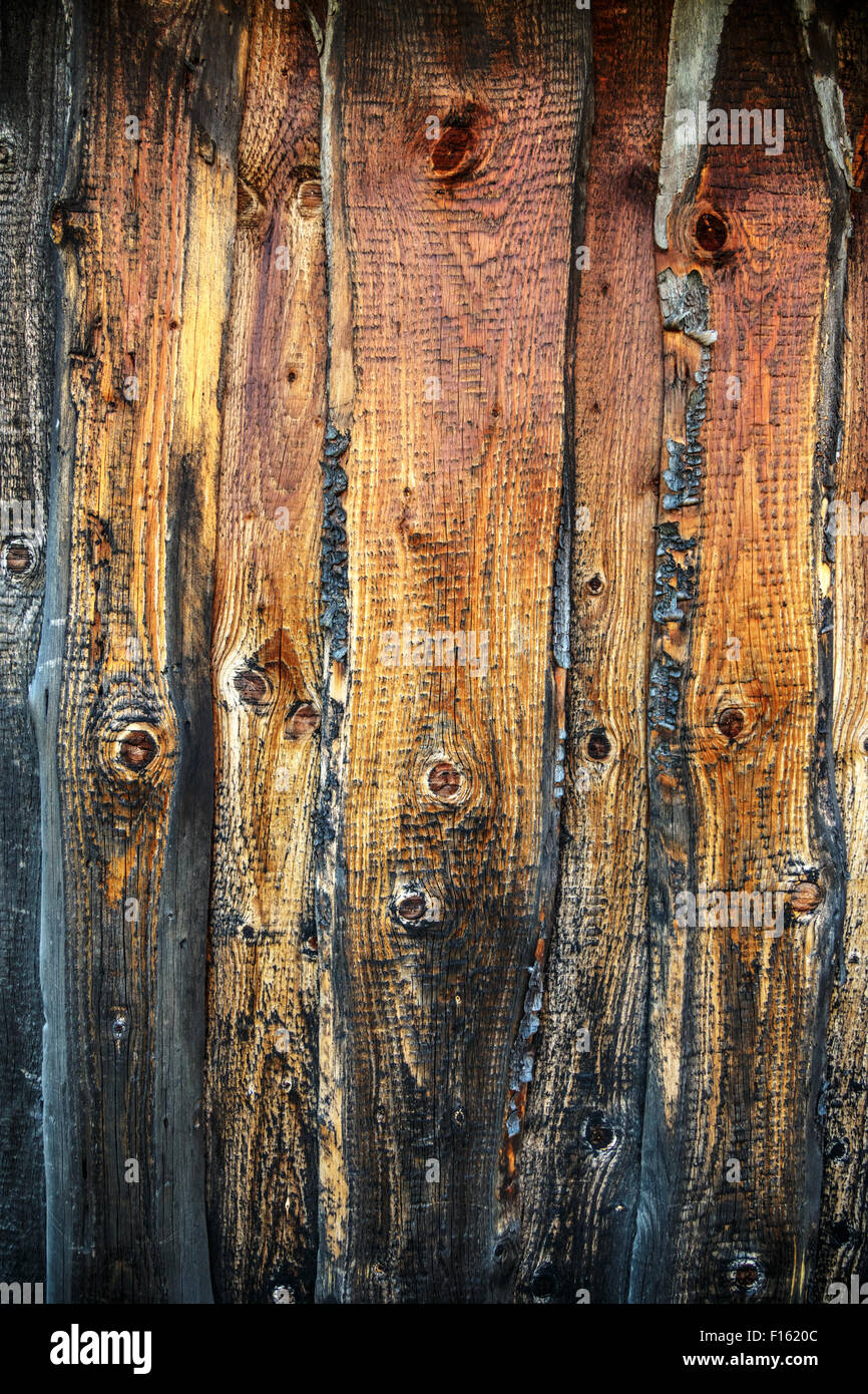 Wooden cracked log material as background closeup Stock Photo - Alamy