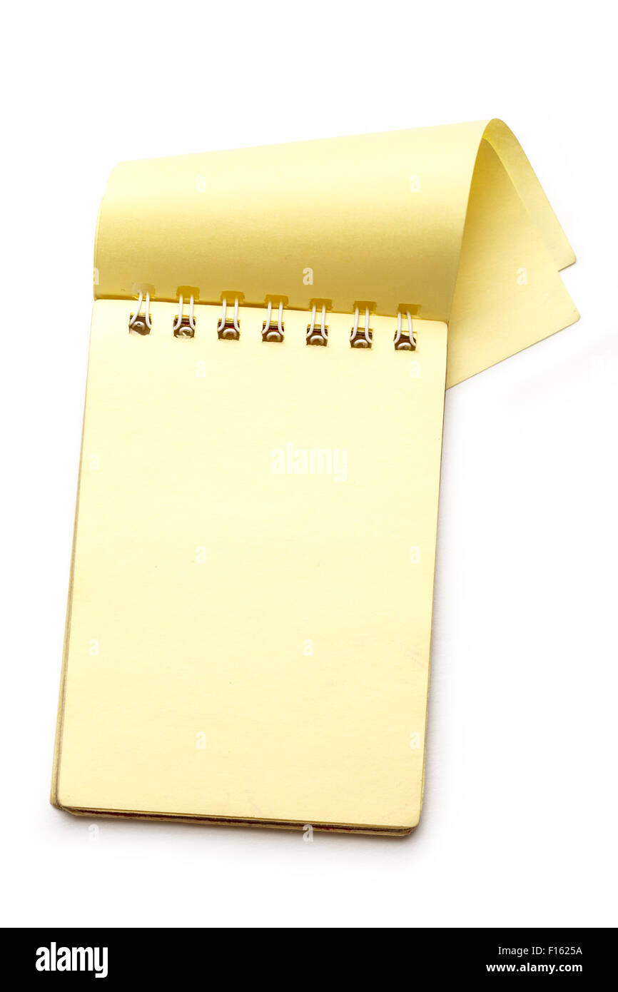 Yellow blank notepad with open page closeup Stock Photo - Alamy