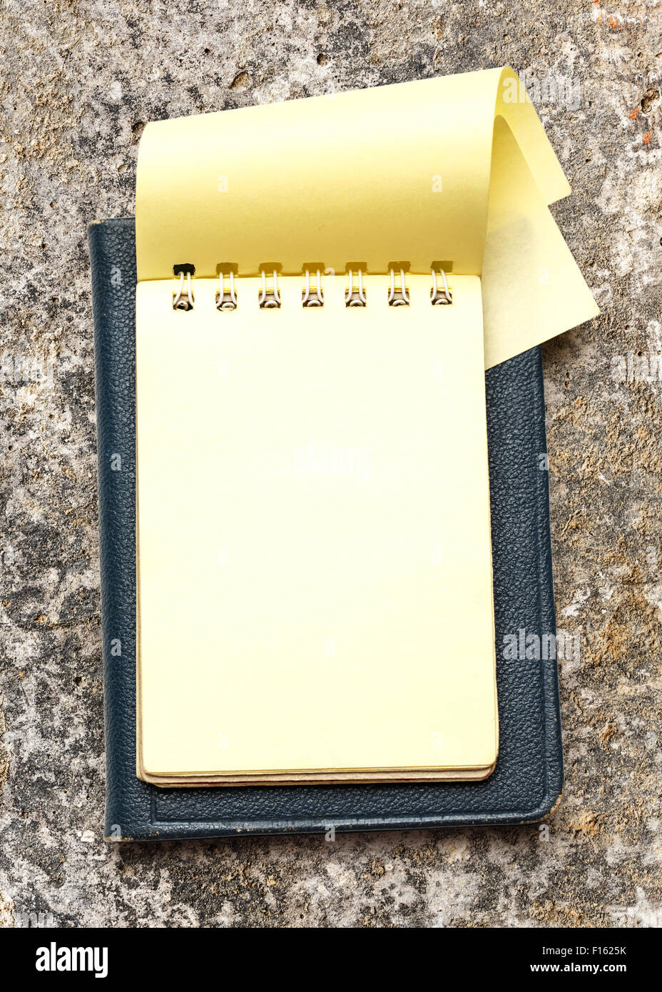 Yellow spiral notepad sheet hi-res stock photography and images - Alamy