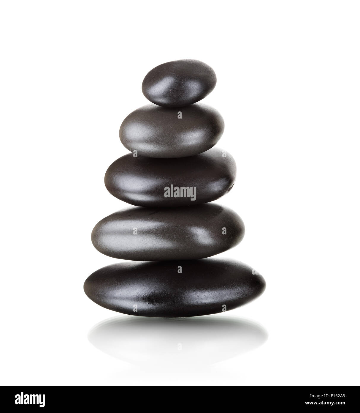 still life of pile black stone for spa treatment, on white background ...