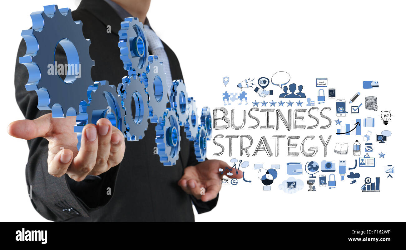 businessman hand show gear cogs and business strategy as concept Stock ...
