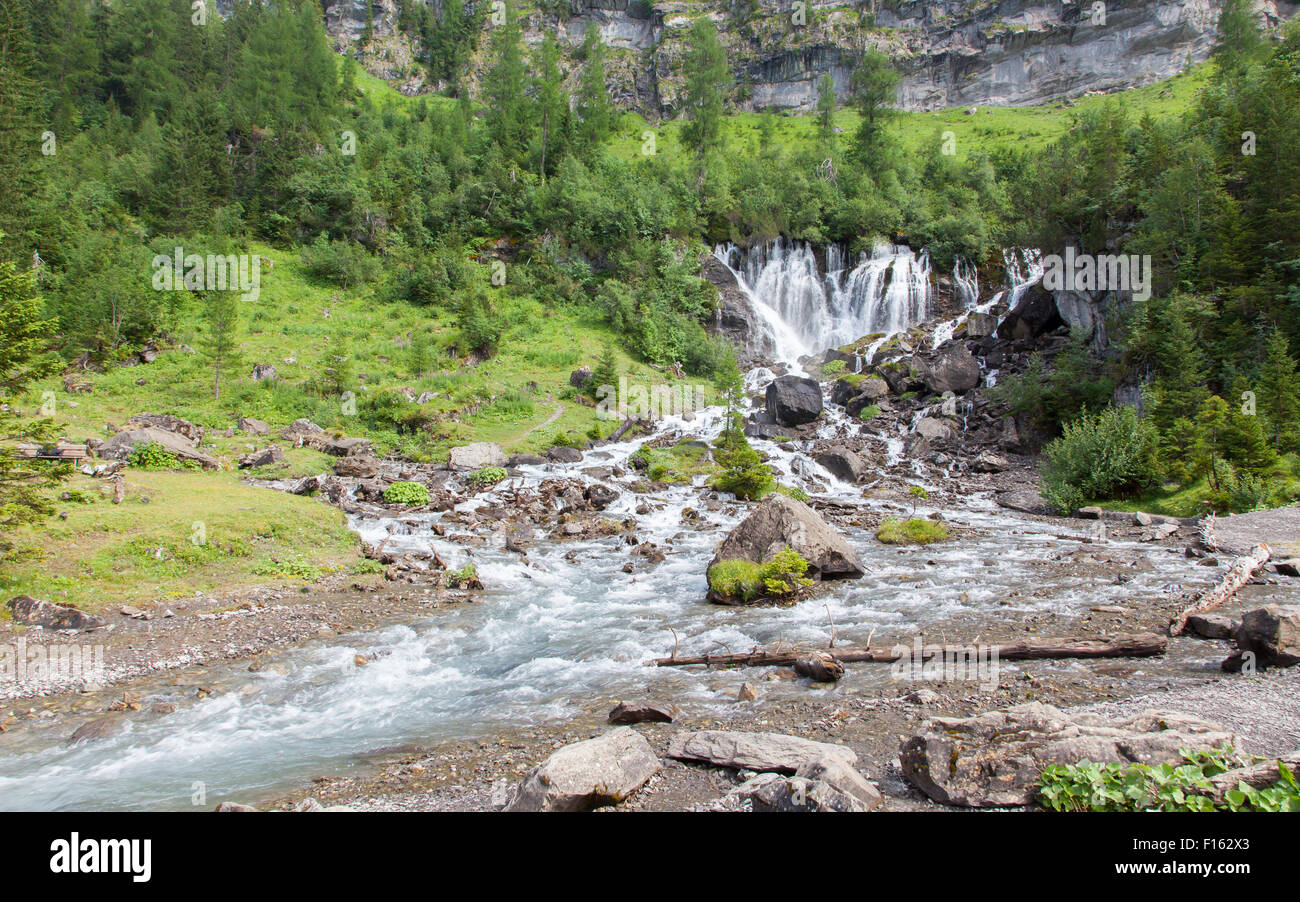 Waterfall in the forest, raging water in Switzerland Stock Photo - Alamy