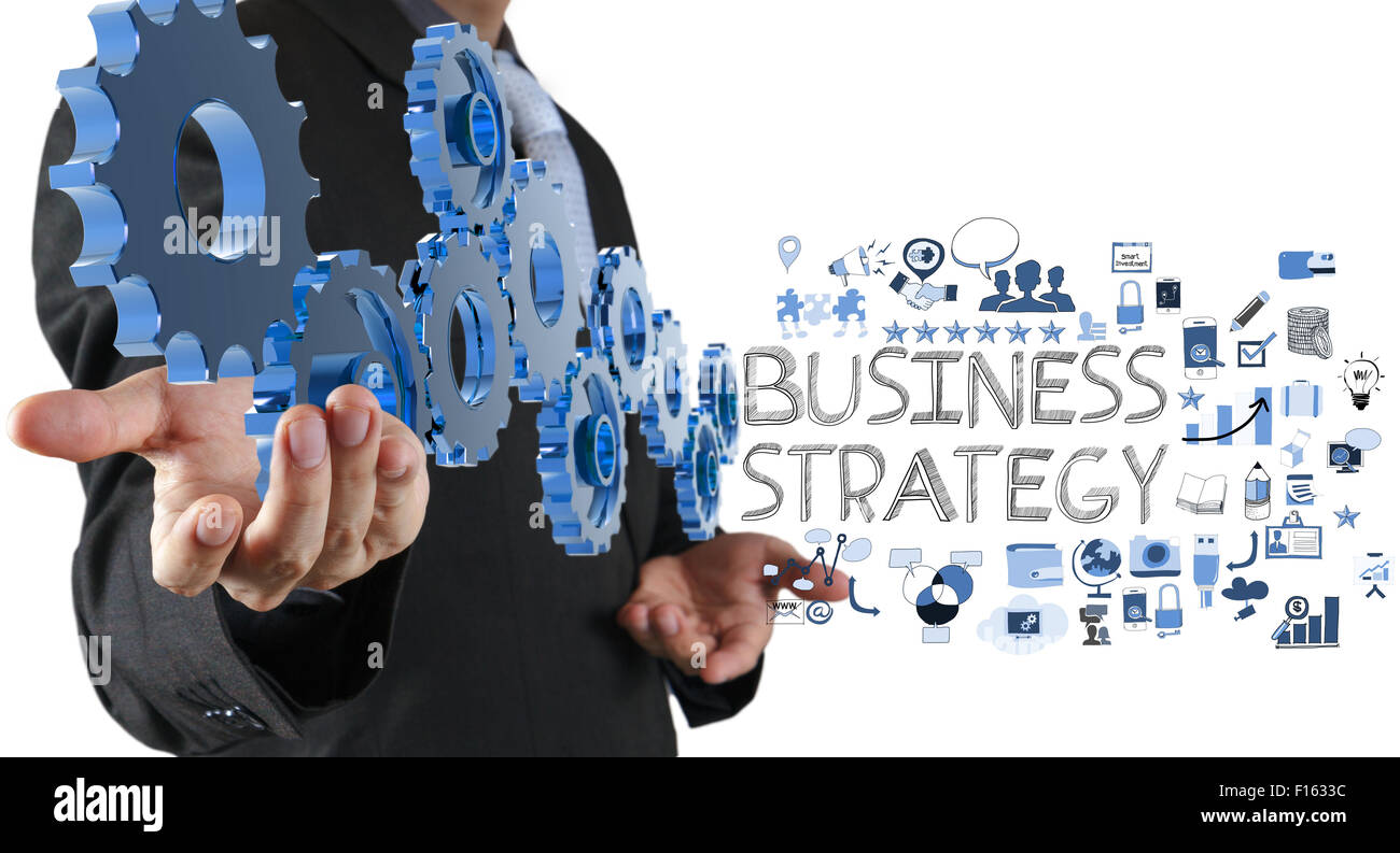 businessman hand show gear cogs and business strategy as concept Stock ...