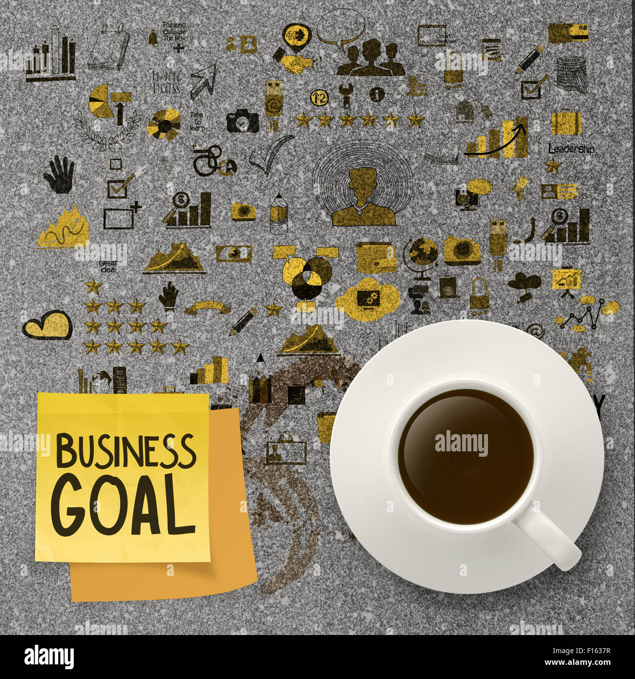 coffee cup with hand drawn business goal strategy on sticky note ...