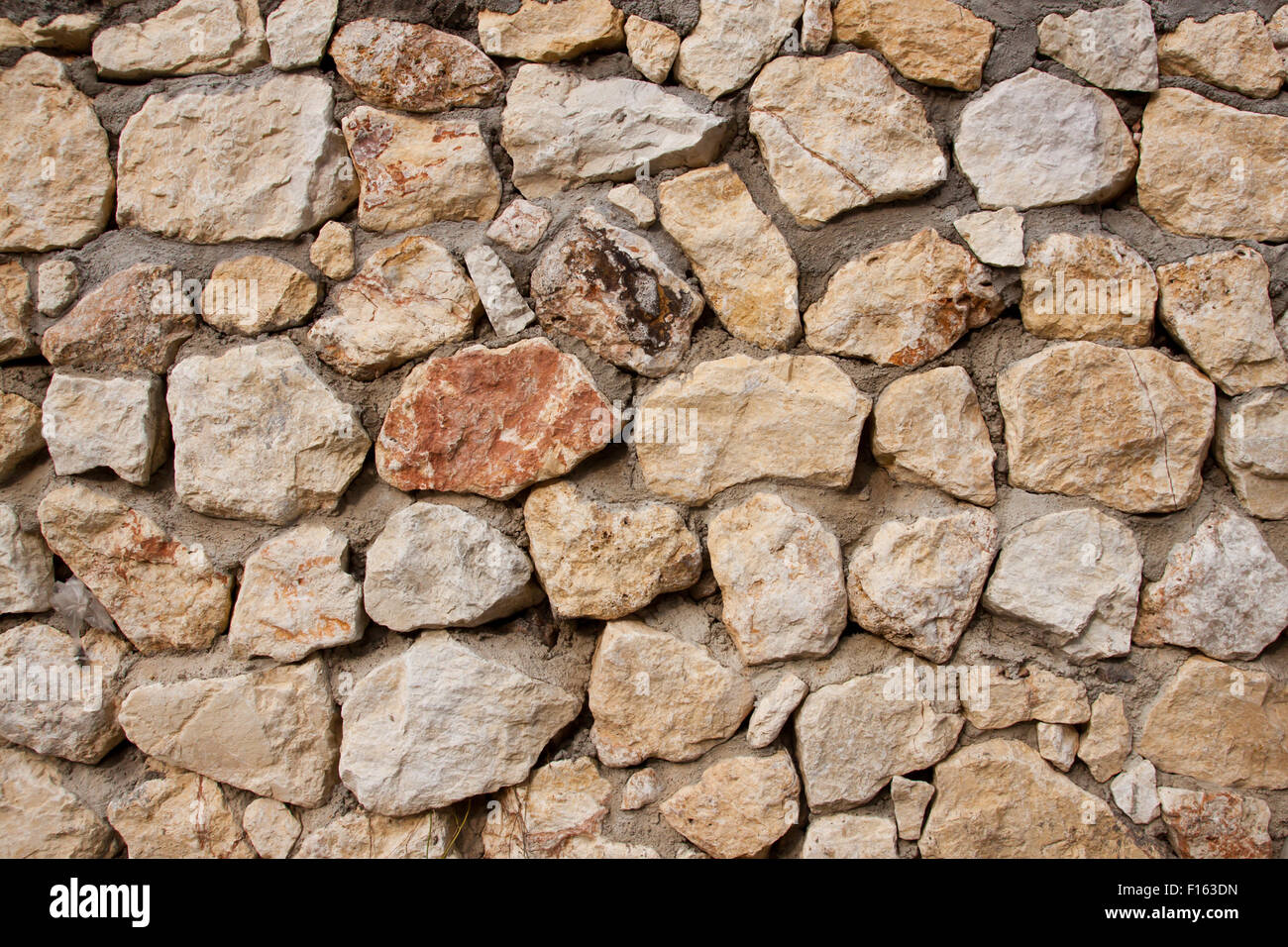 Stone Brick Wall made of fragment stones Stock Photo - Alamy