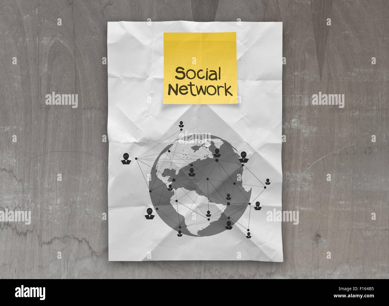 sticky note social network icon on crumpled paper background as concept ...