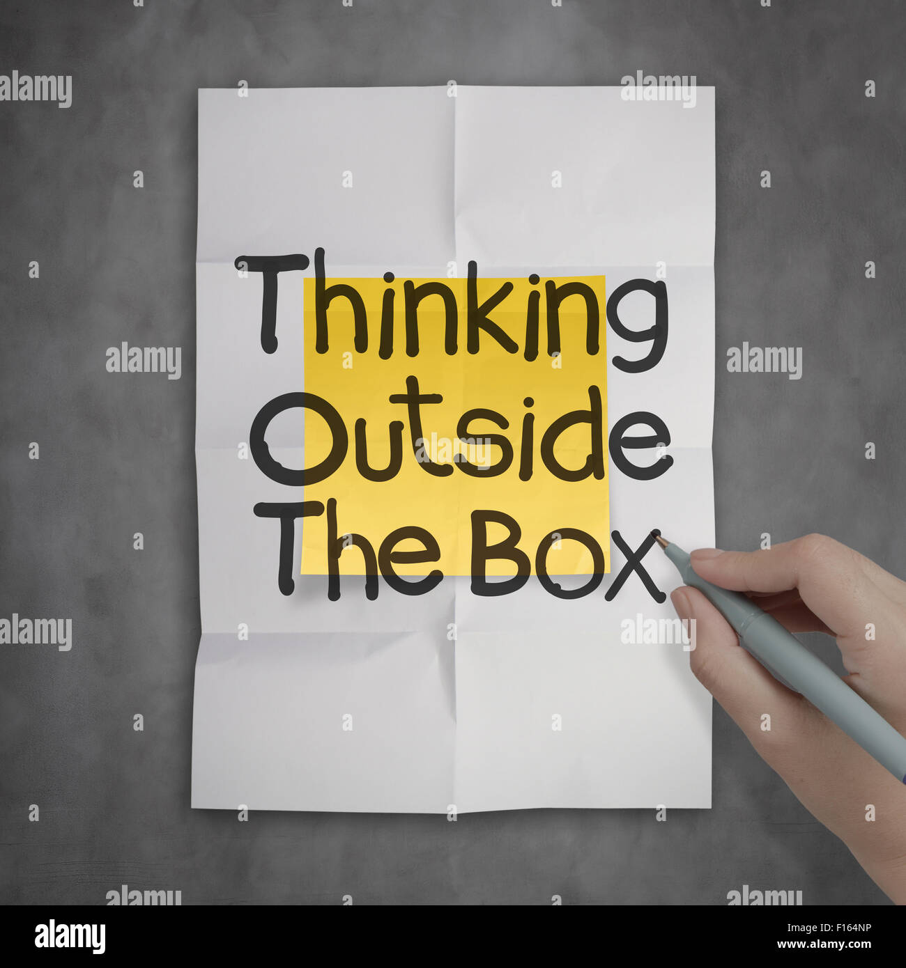 thinking outside the box on crumpled sticky note paper as concept Stock ...