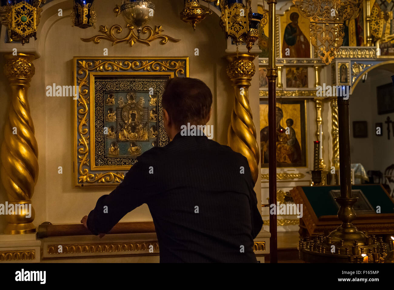 A parishioner venerates the 13th-Century Kursk-Root Icon which returned ...