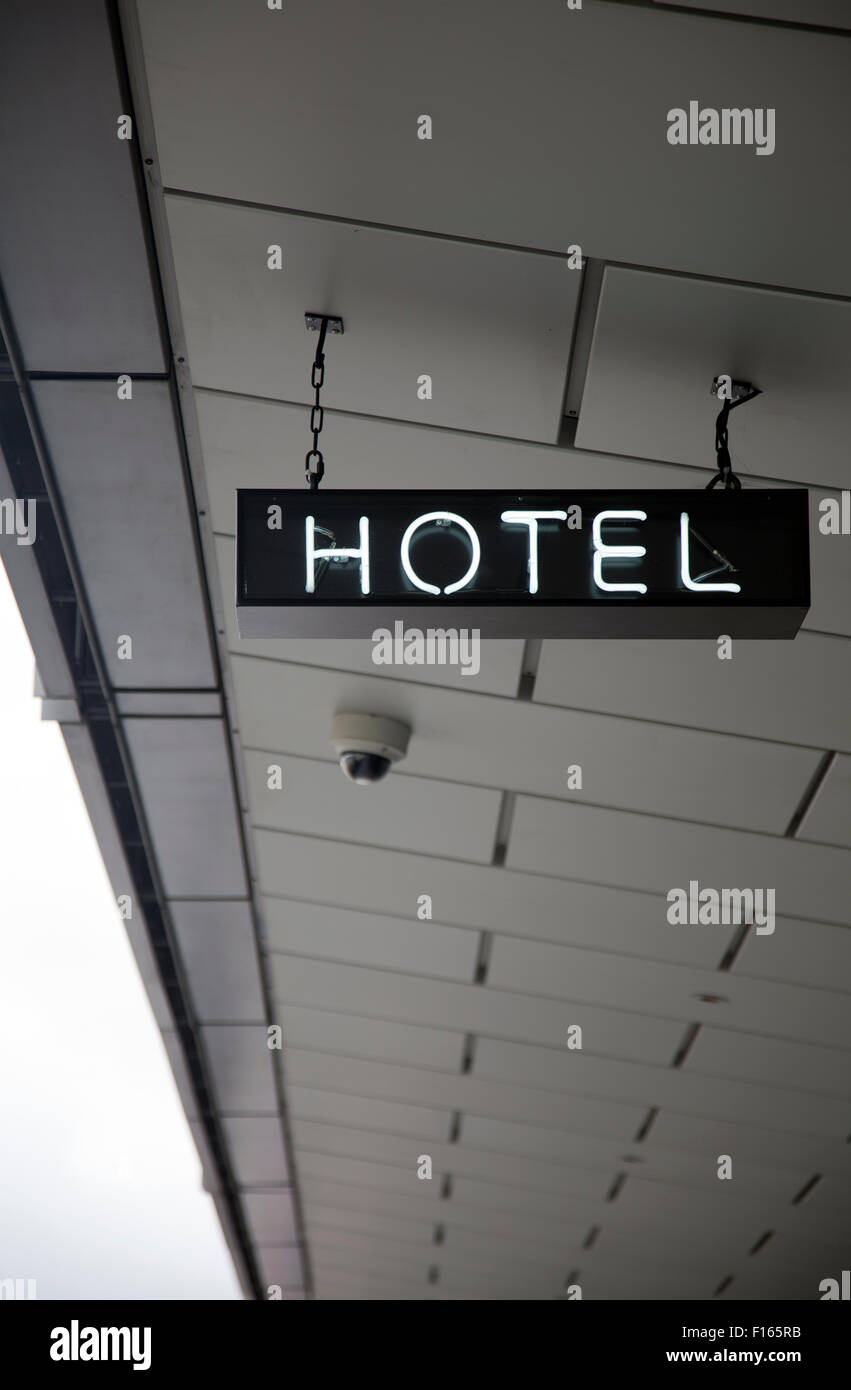 Hanging Hotel Sign Stock Photo - Alamy
