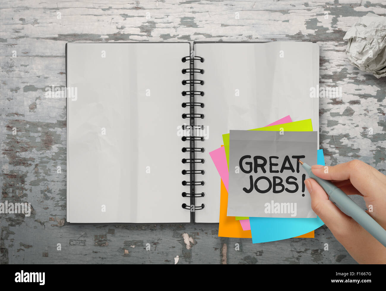 great job word sticky notes with open blank note book on desk top ...