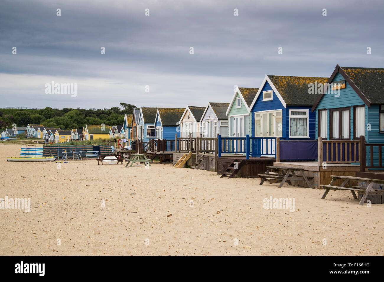 Beach huts on sand dunes and beach landscape Stock Photo - Alamy
