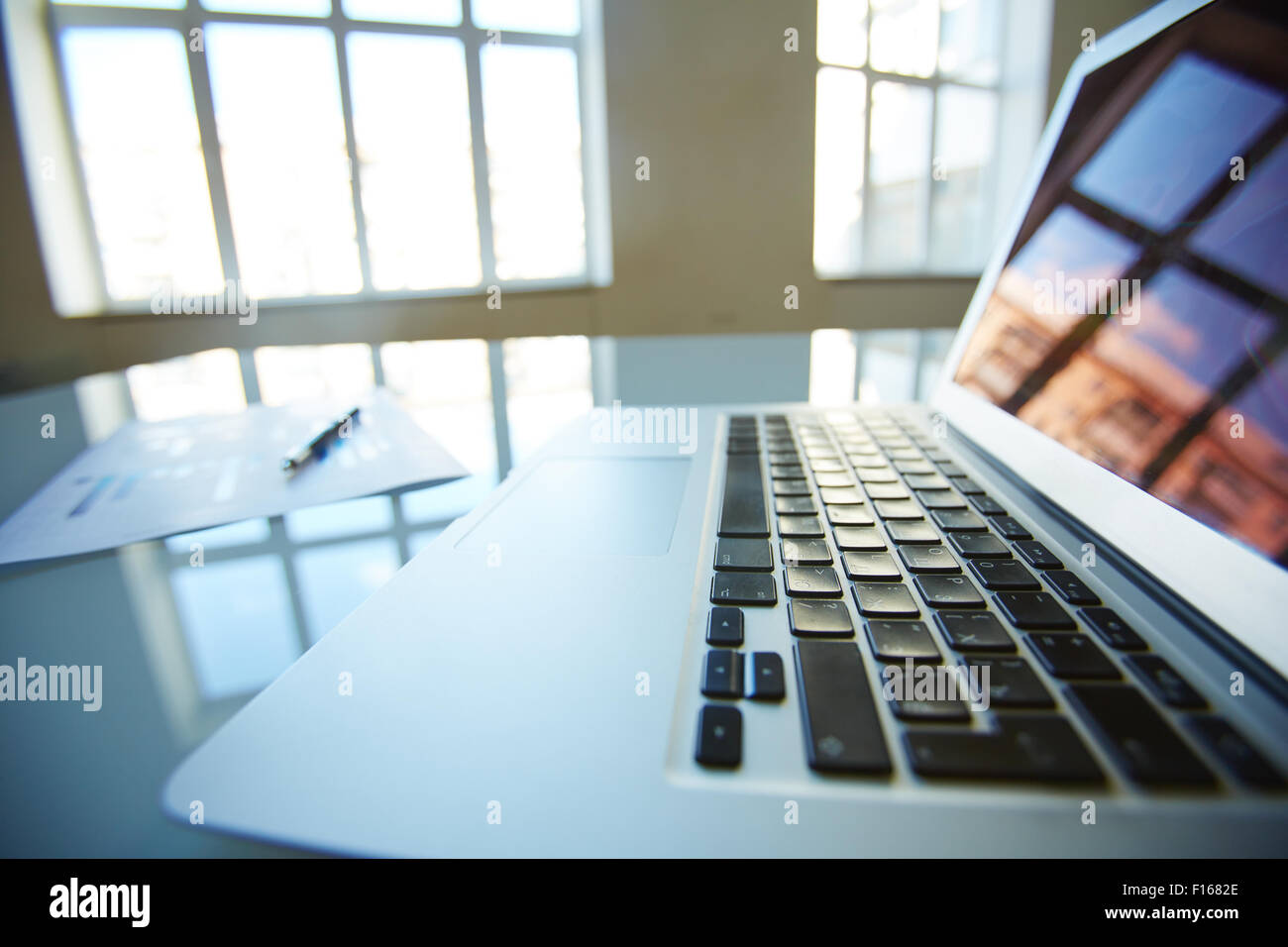 Close-up of open laptop on table Stock Photo - Alamy