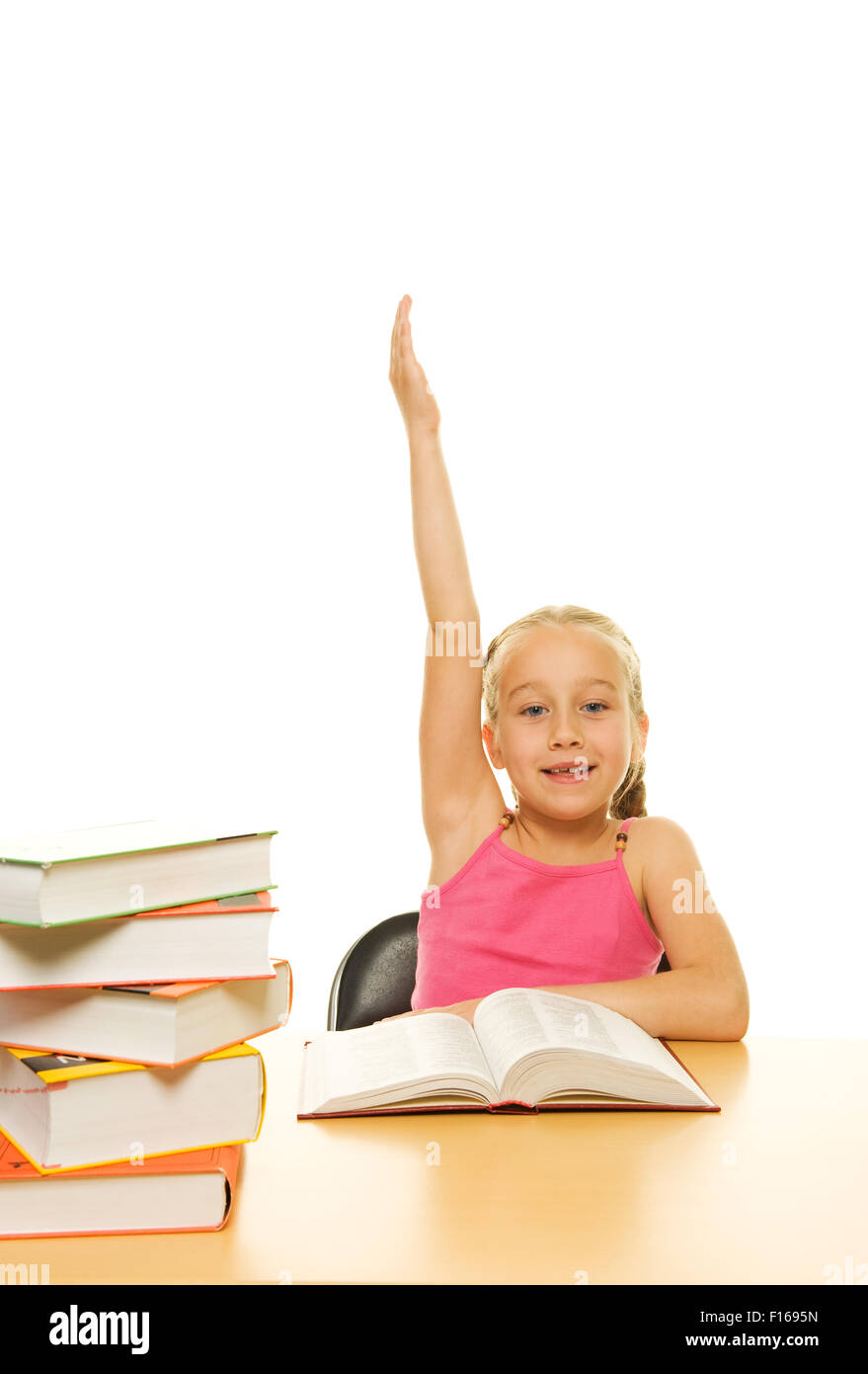 Little schoolgirl raised her hand to answer question Stock Photo - Alamy