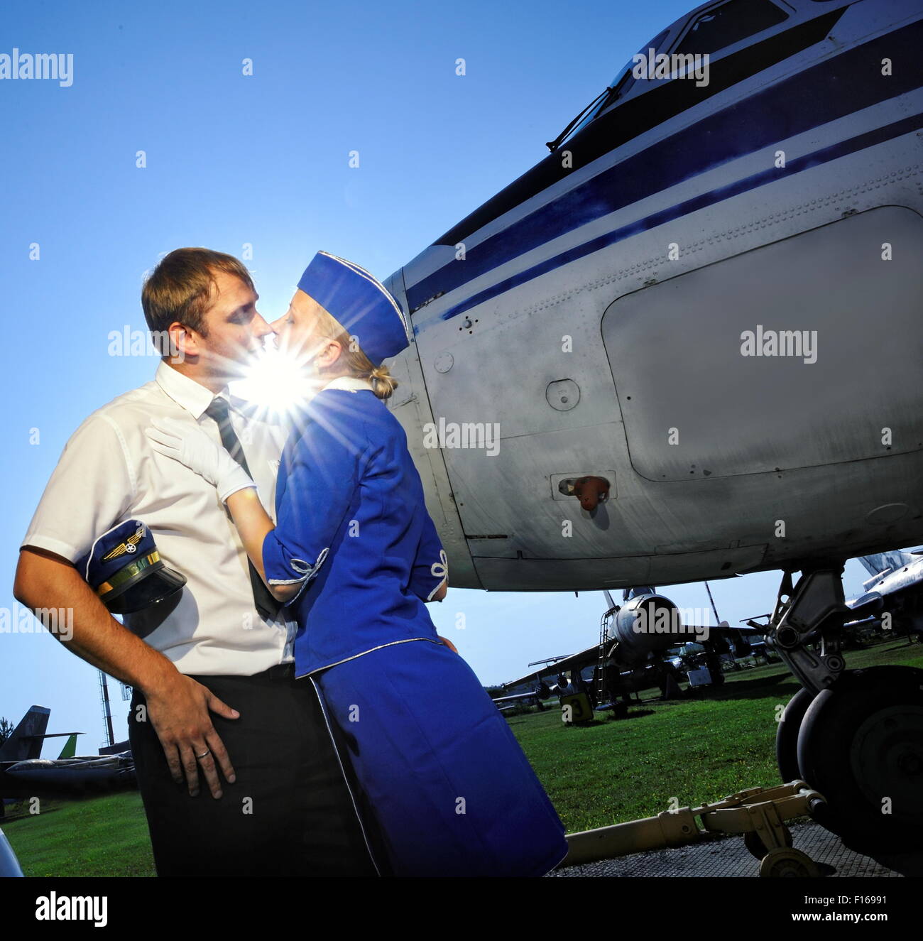 Cabin crew couple Stock Photo - Alamy