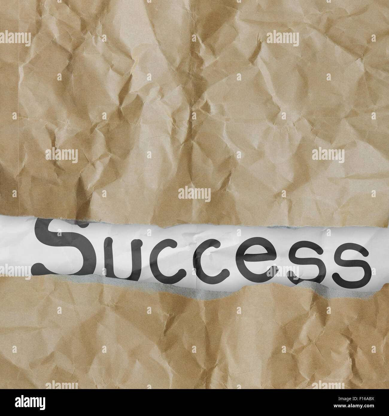 hand drawn success words on crumpled paper with tear envelope as ...