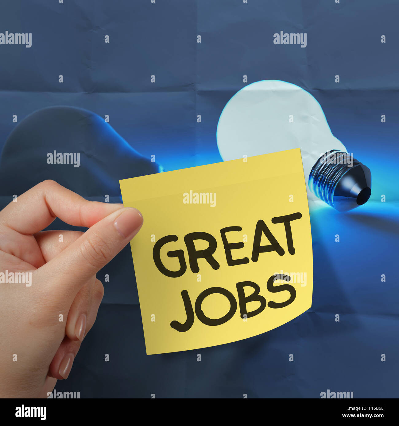 hand holding great jobs words sticky note on lightbulb crumpled paper ...
