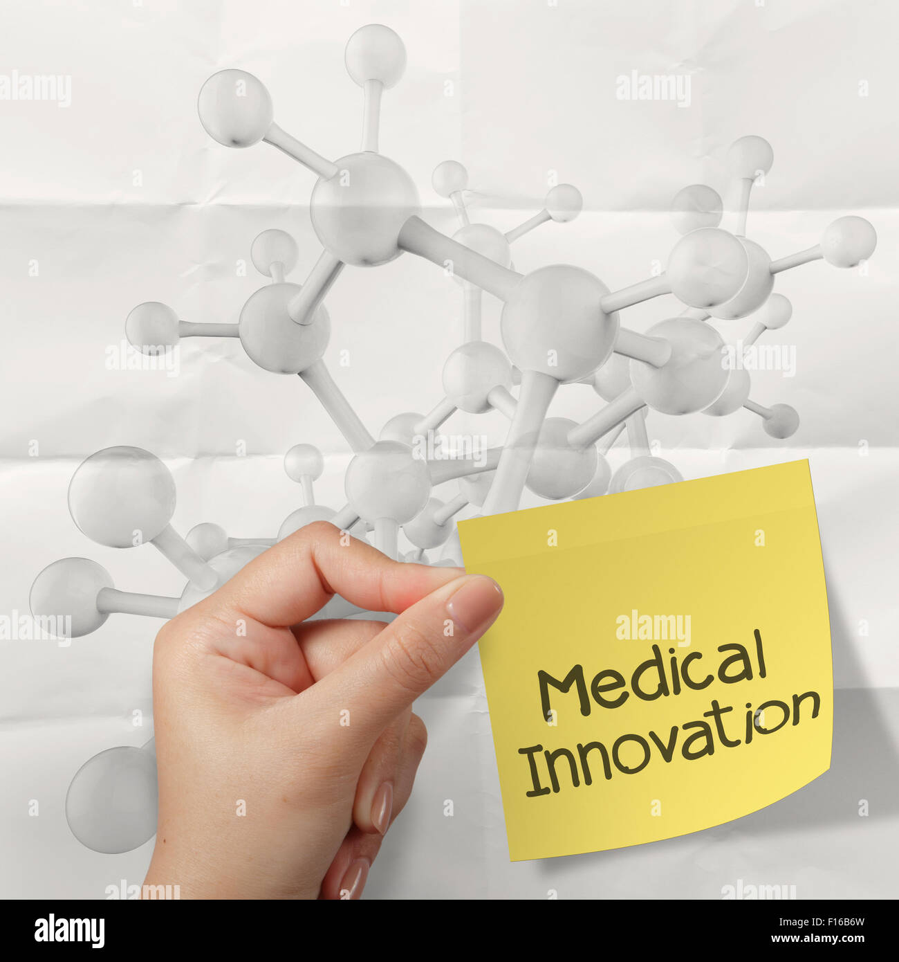 hand holding meducal innovation on sticky note Molecule white 3d on ...