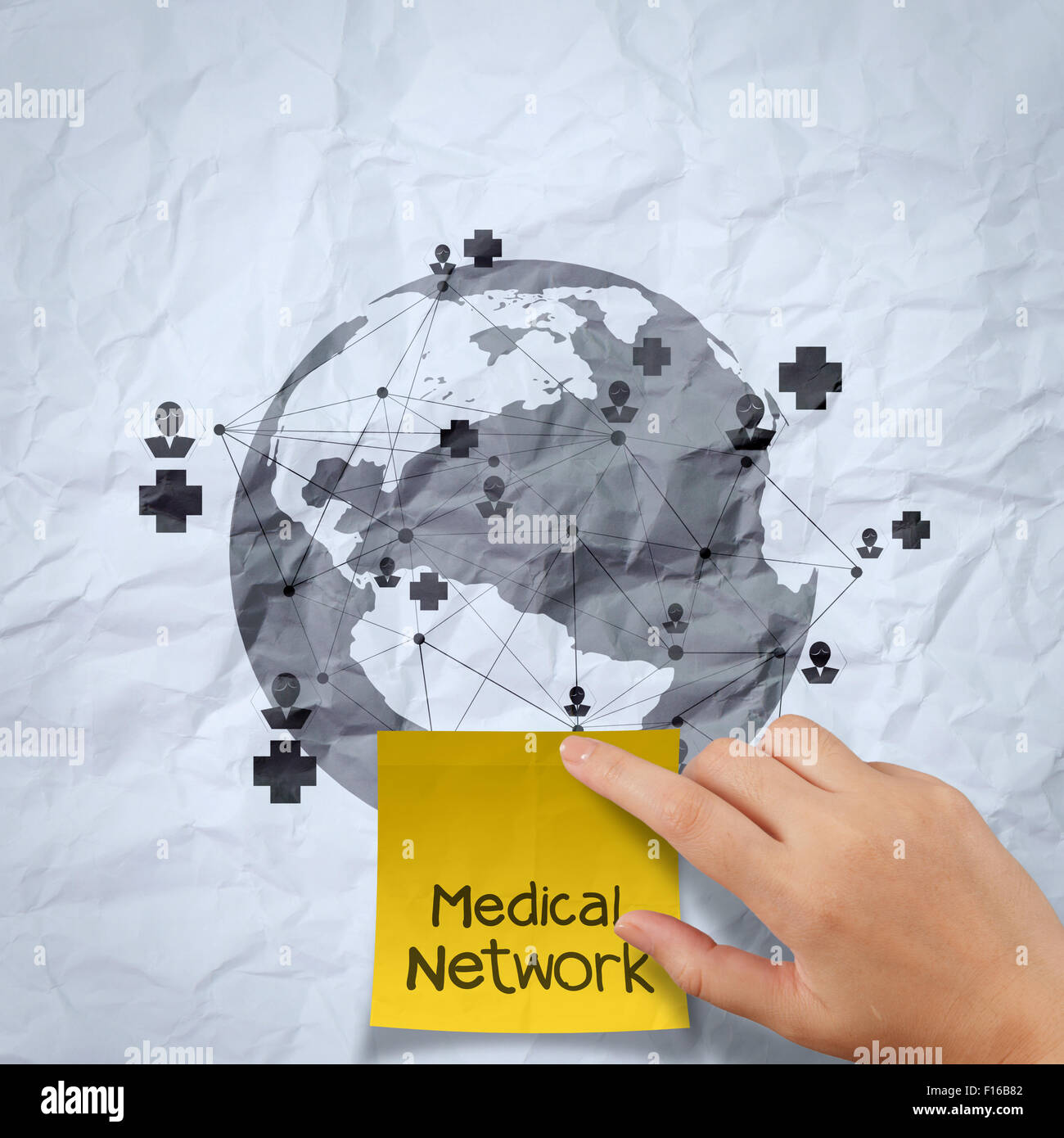 hand show medical network on sticky note on crumpled paper as concept ...