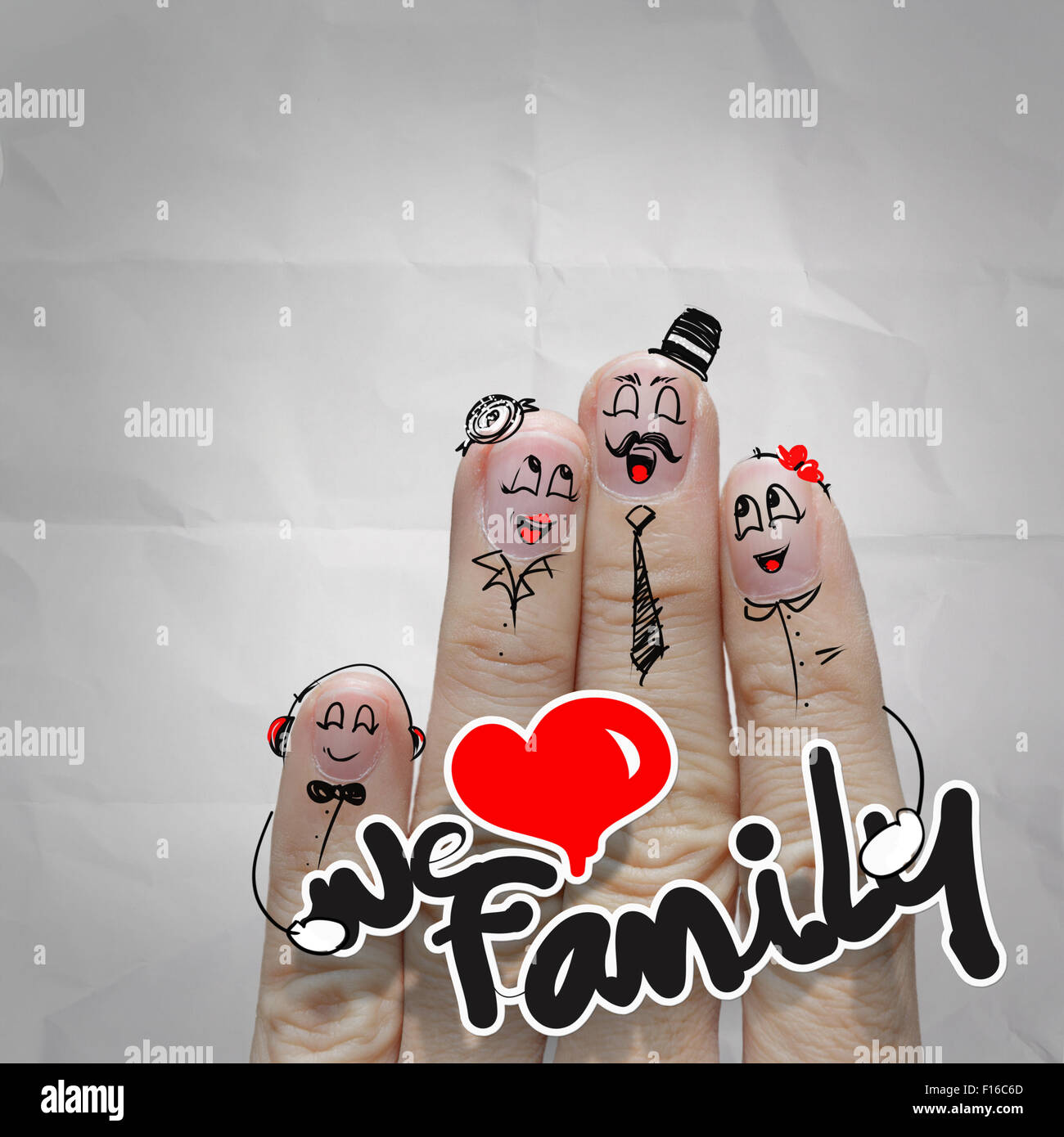 happy finger couple in love with painted smiley on crumpled paper ...