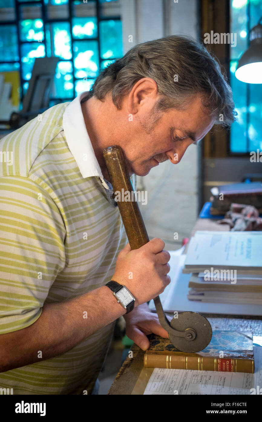 Bookbinding tools hi-res stock photography and images - Alamy