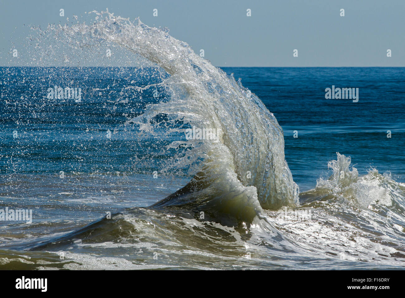 Two waves colliding together to cause a beautiful water feature Stock ...