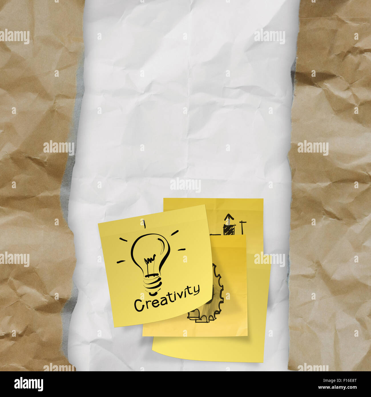 sticky note with light bulb on crumpled paper as creative concept Stock ...