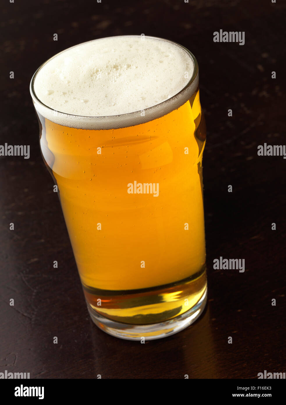 Lager on a tabletop Stock Photo - Alamy