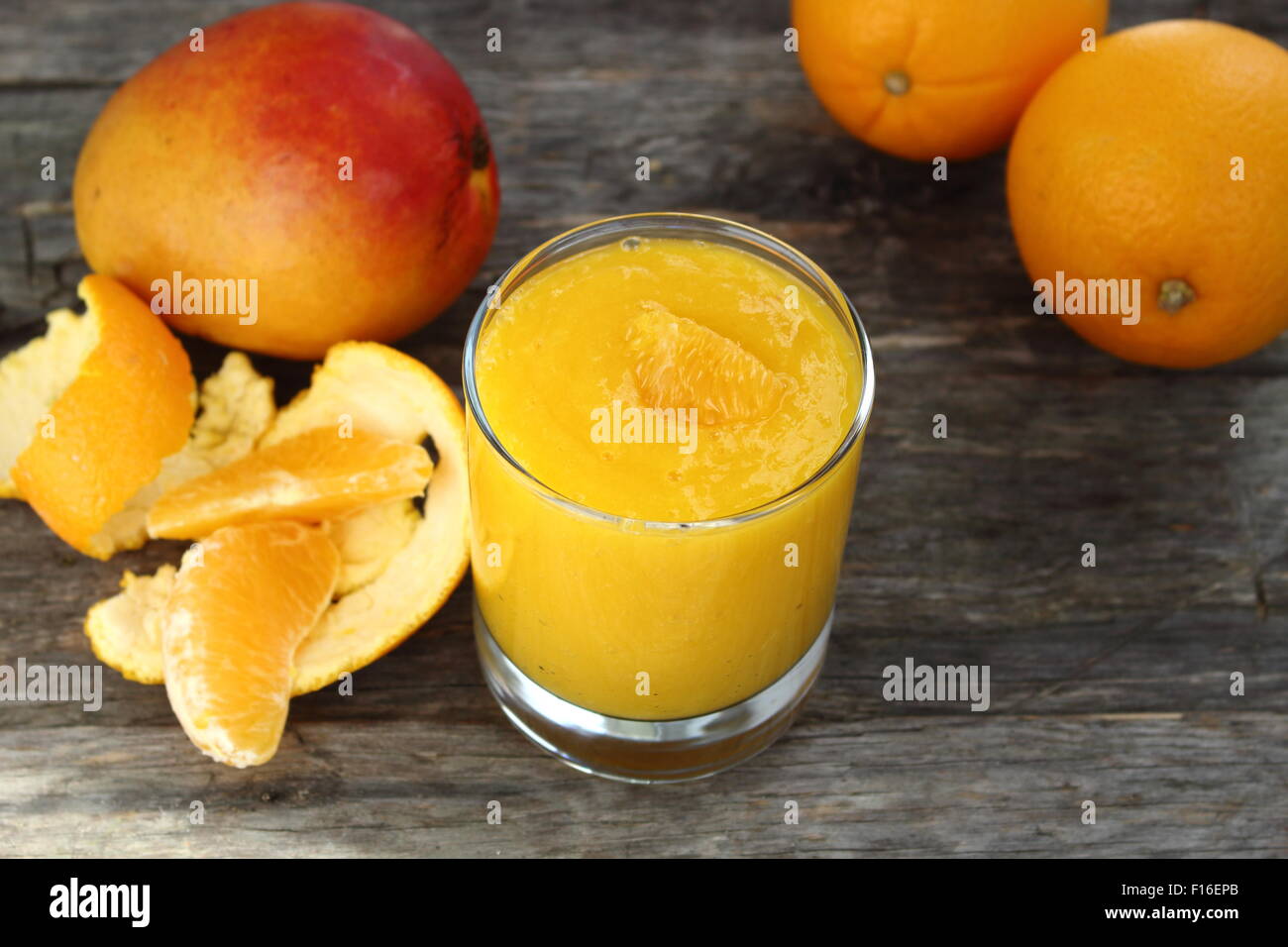 Orange and mango smoothie Stock Photo - Alamy