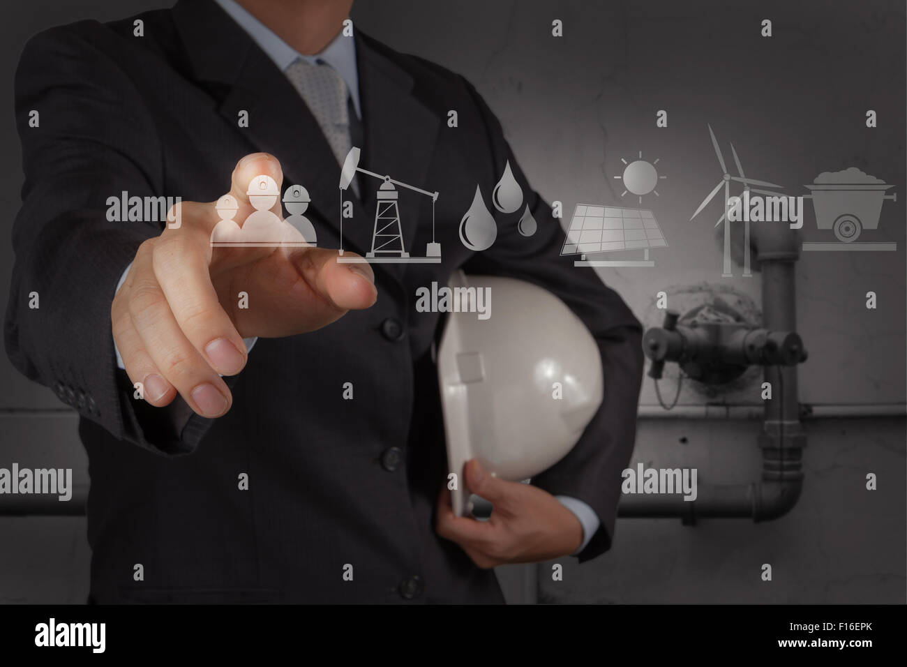 engineer working new computer with the piping of an industrial waste ...