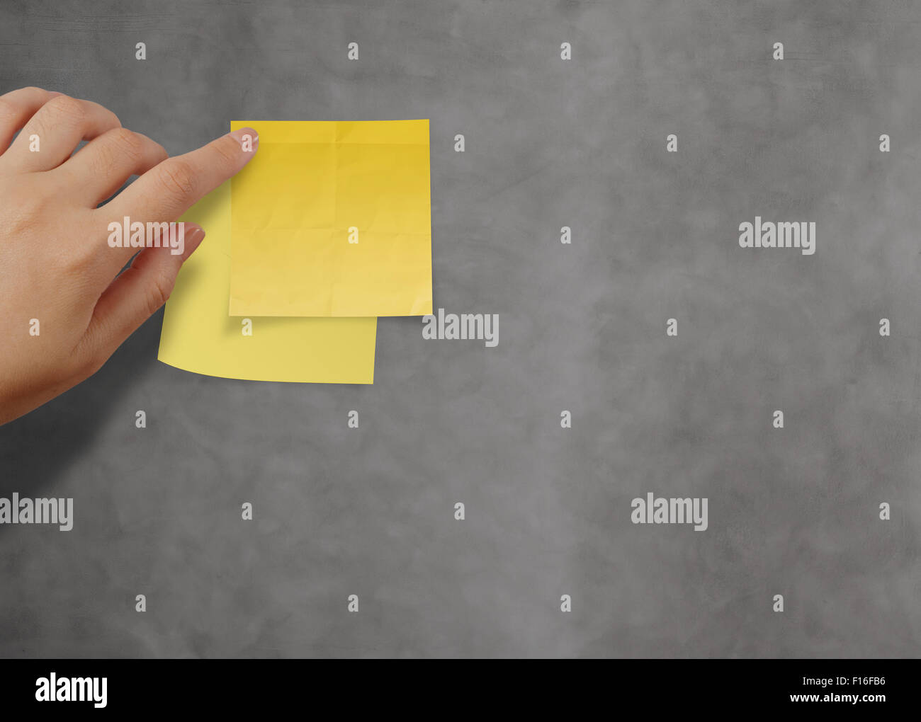 blank crumpled sticky note paper on texture wall as concept Stock Photo ...