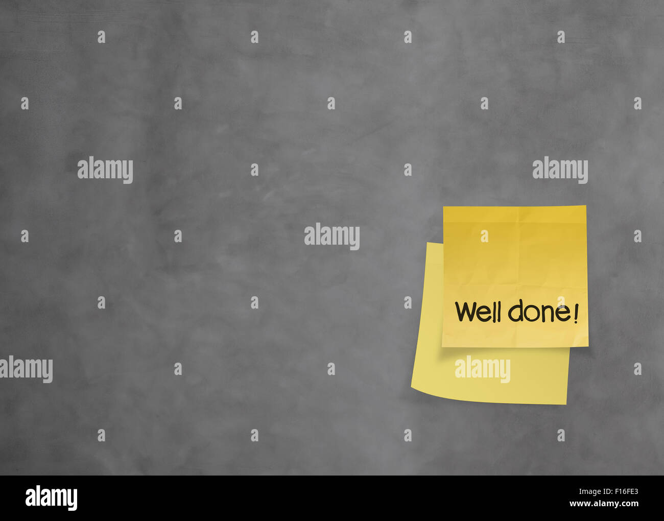 well done words on crumpled sticky note paper on texture wall as ...