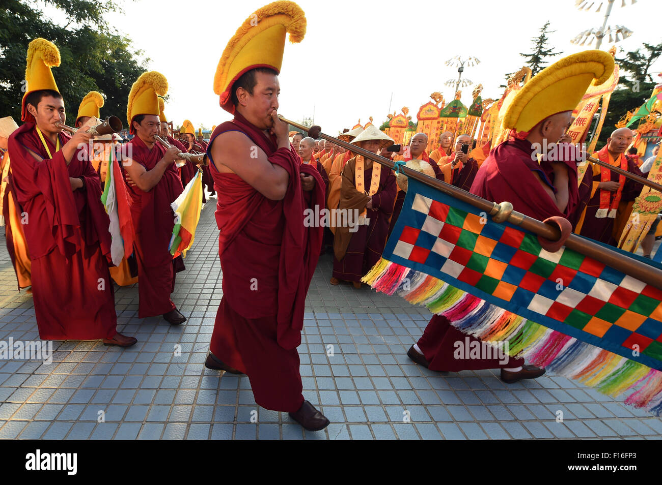 Pingliang, China's Gansu Province. 28th Aug, 2015. Monks wind ...