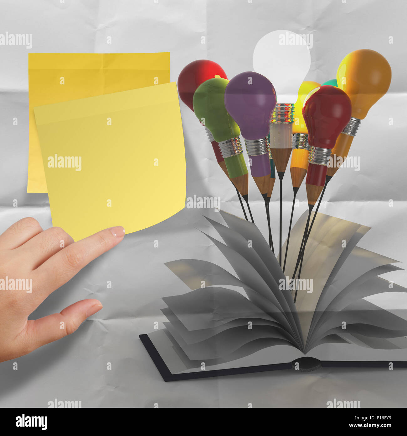 drawing idea pencil and light bulb concept outside the book with splash ...