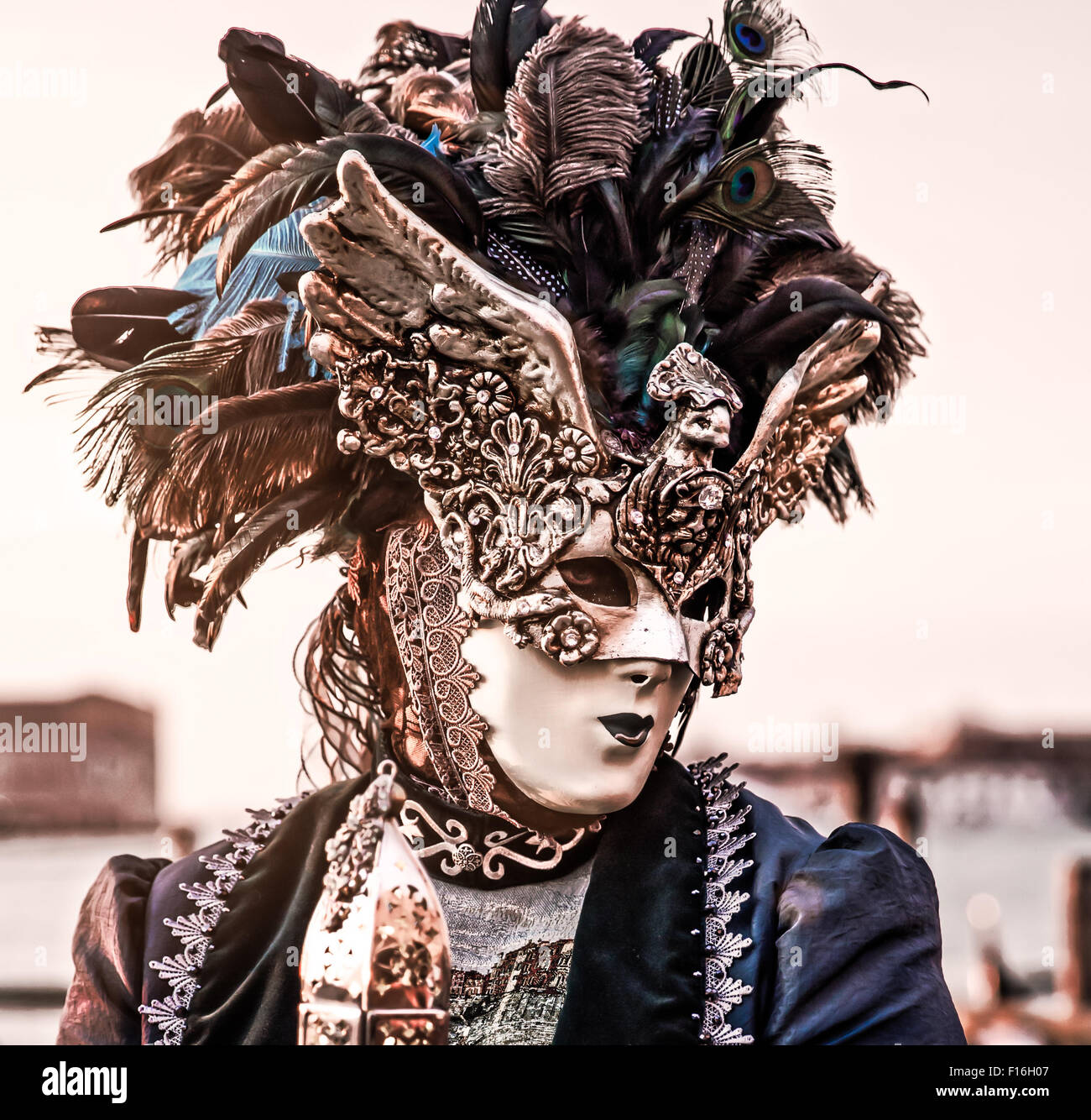 A headdress with a winged mask and peacock feathers at the Venice ...