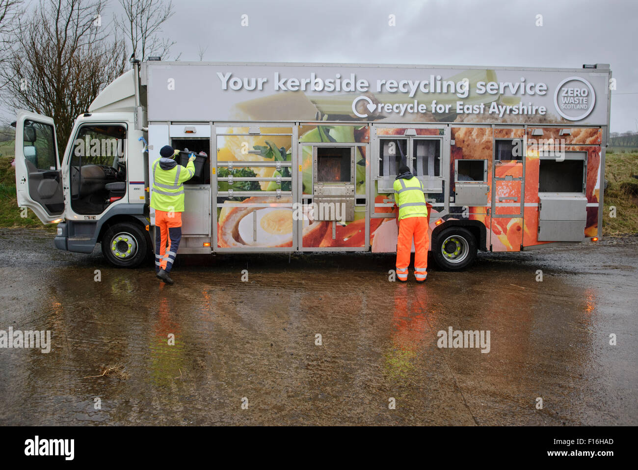 Kerbside recycling collection lorry and workers in rural area Stock ...