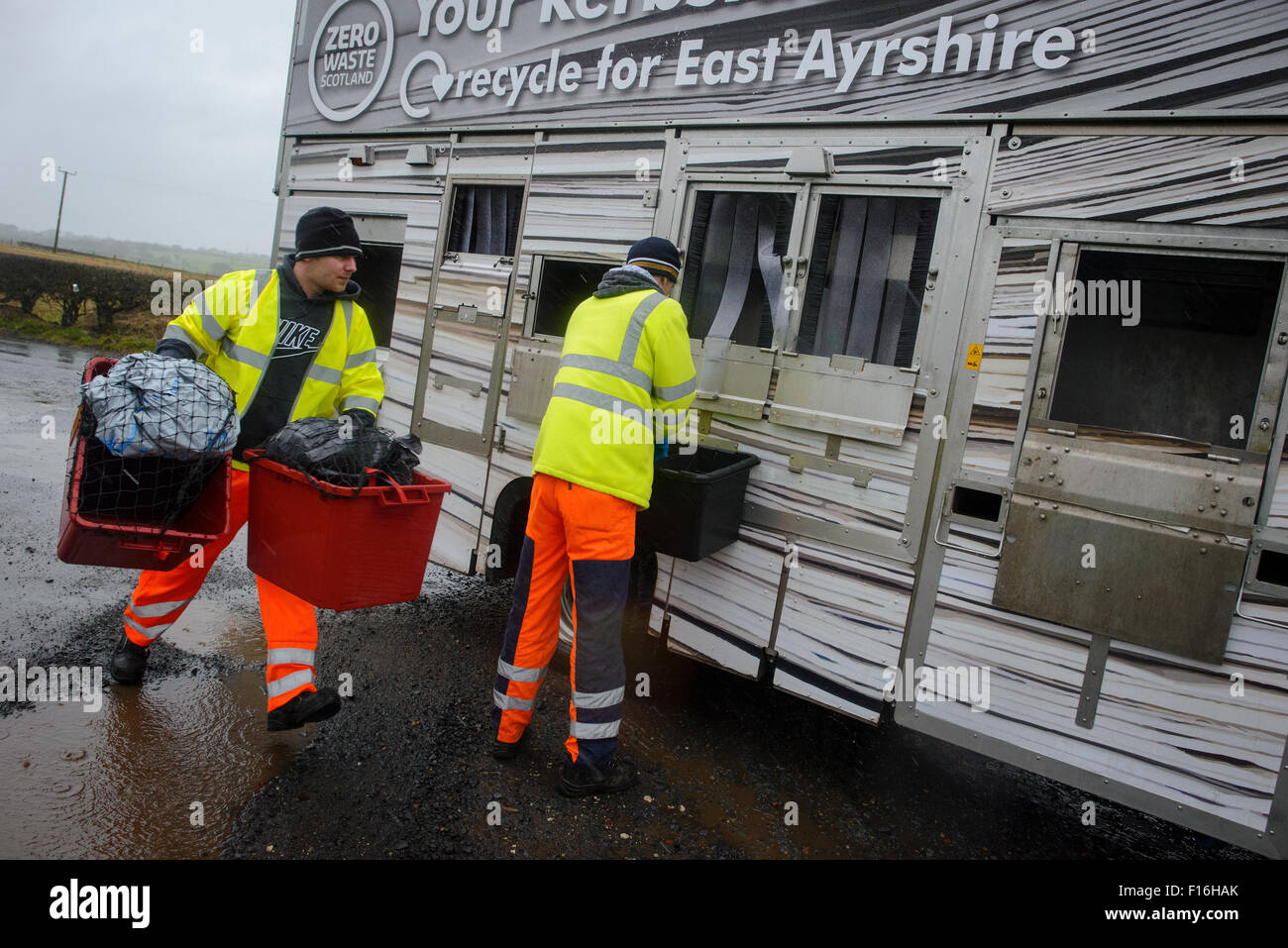 Kerbside recycling collection lorry and workers in rural area Stock ...