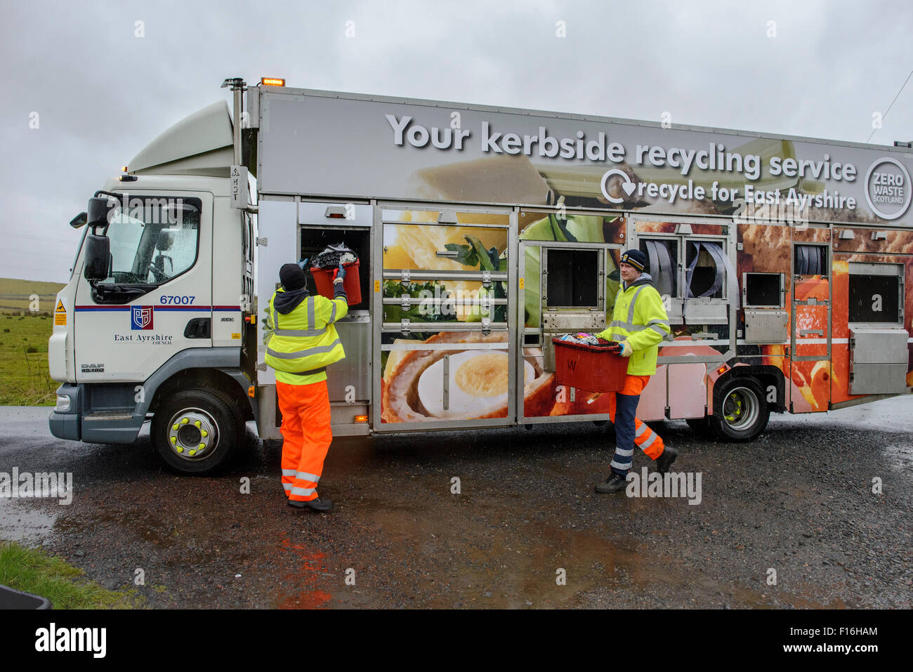 Kerbside recycling collection lorry and workers in rural area Stock ...