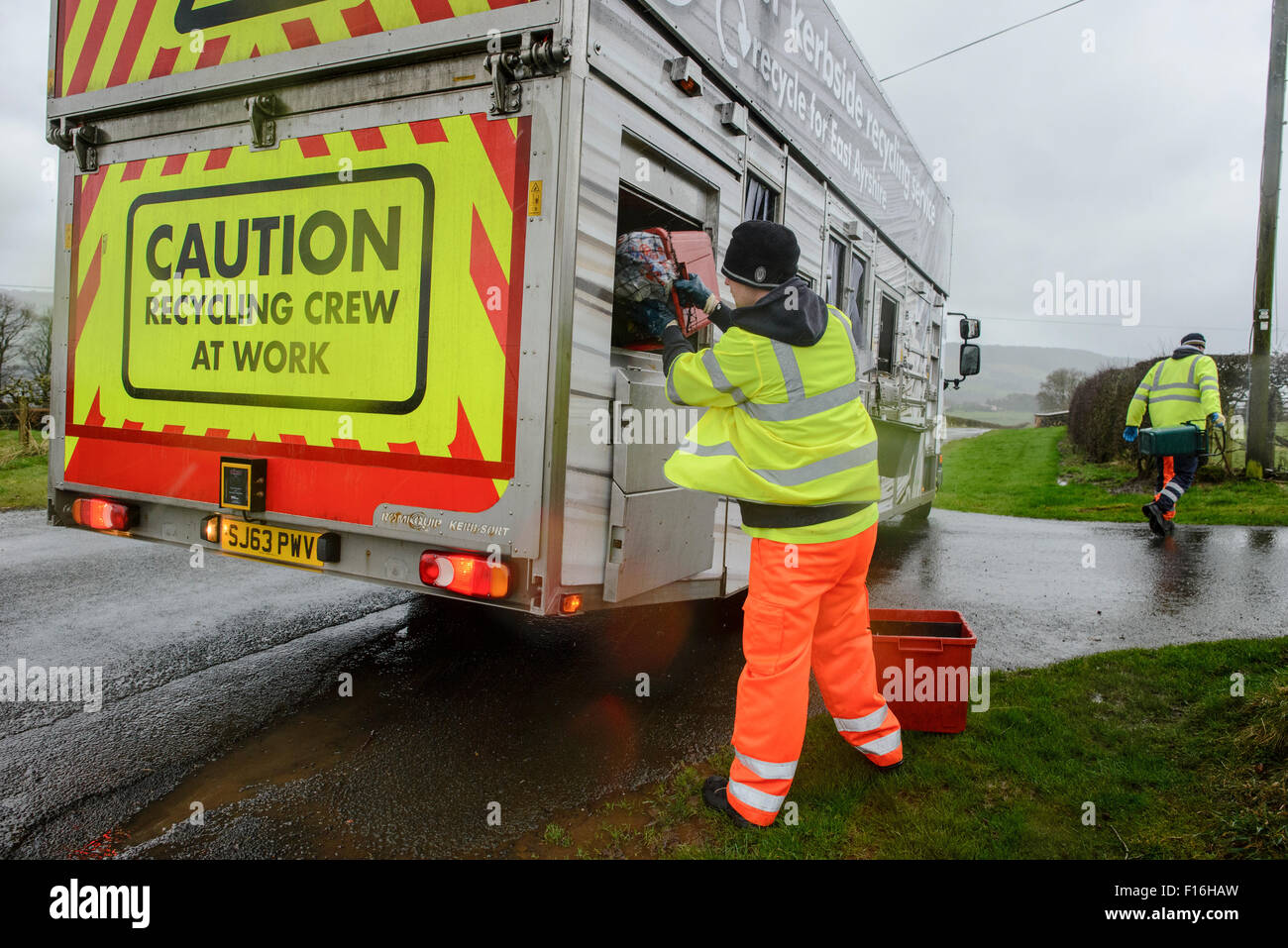 Kerbside recycling collection lorry and workers in rural area Stock ...