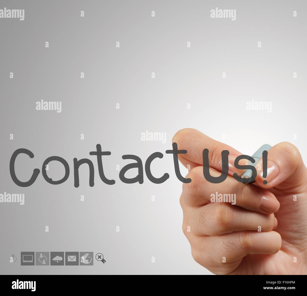 Hand writing Contact us as concept Stock Photo - Alamy