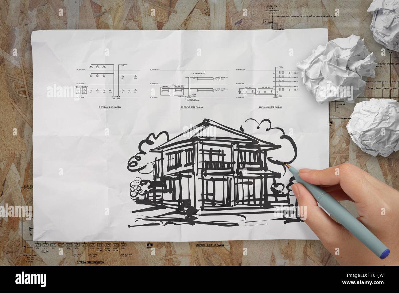 hand drawing house on wrinkled paper as concept Stock Photo - Alamy