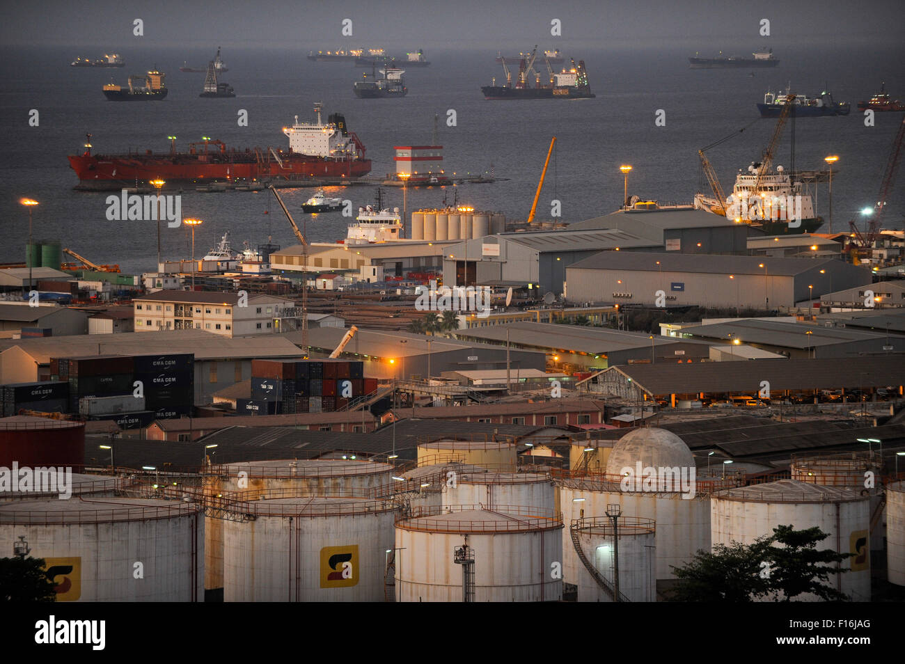 ANGOLA Luanda, harbour and anchorage, in front oil tanks of Sonangol ...