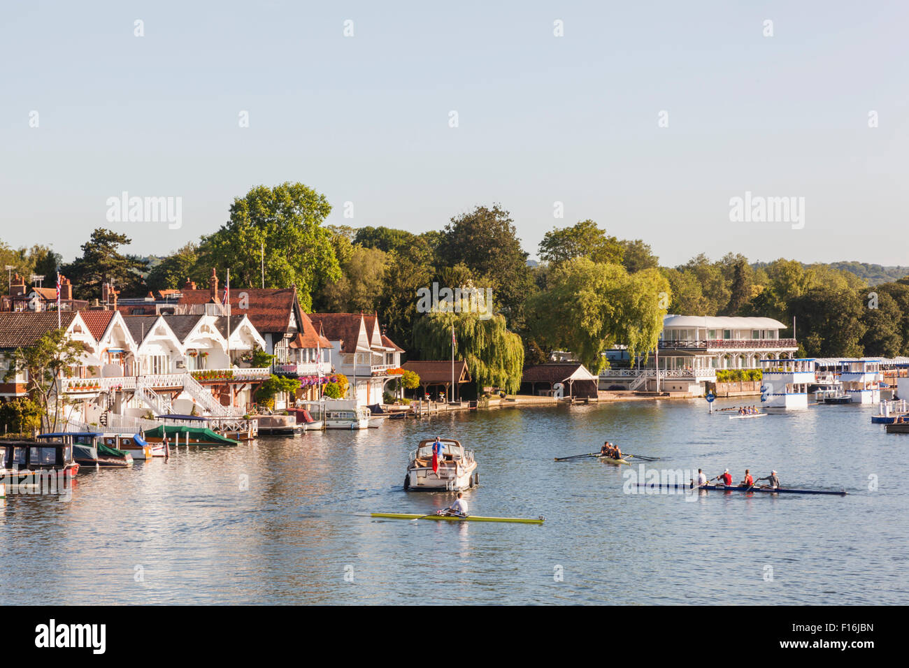 England, Oxfordshire, Henley-on-Thames, Boathouses and Rowers on River ...