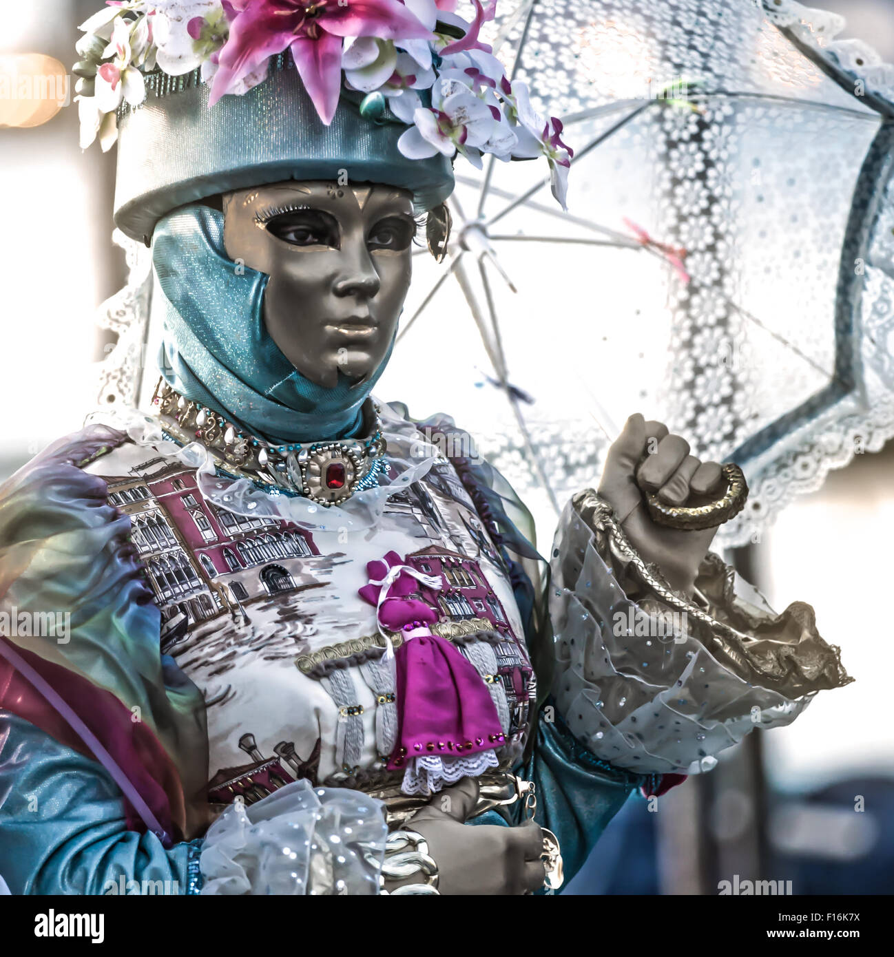 The Parasol Girl in flamboyant costume at the Venice carnival Stock ...