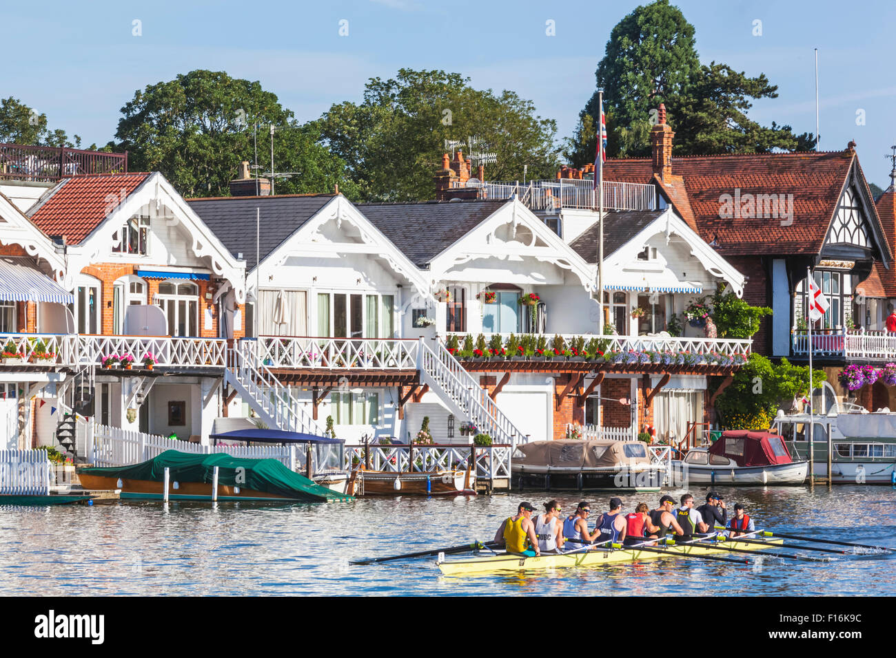 England, Oxfordshire, Henley-on-Thames, Boathouses and Rowers on River ...