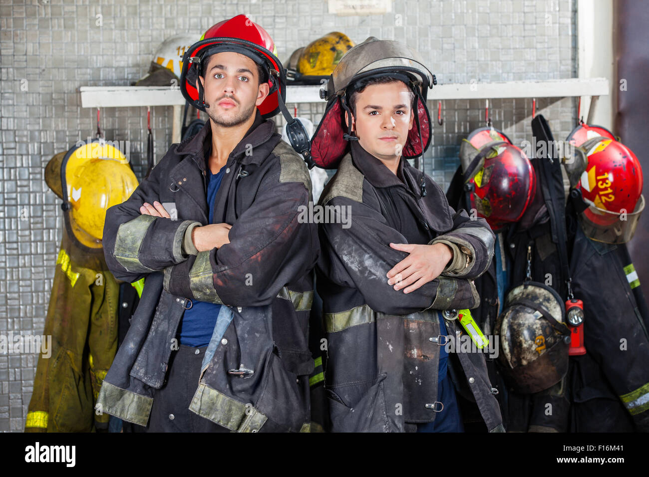 Confident Firemen Standing Arms Crossed Stock Photo - Alamy